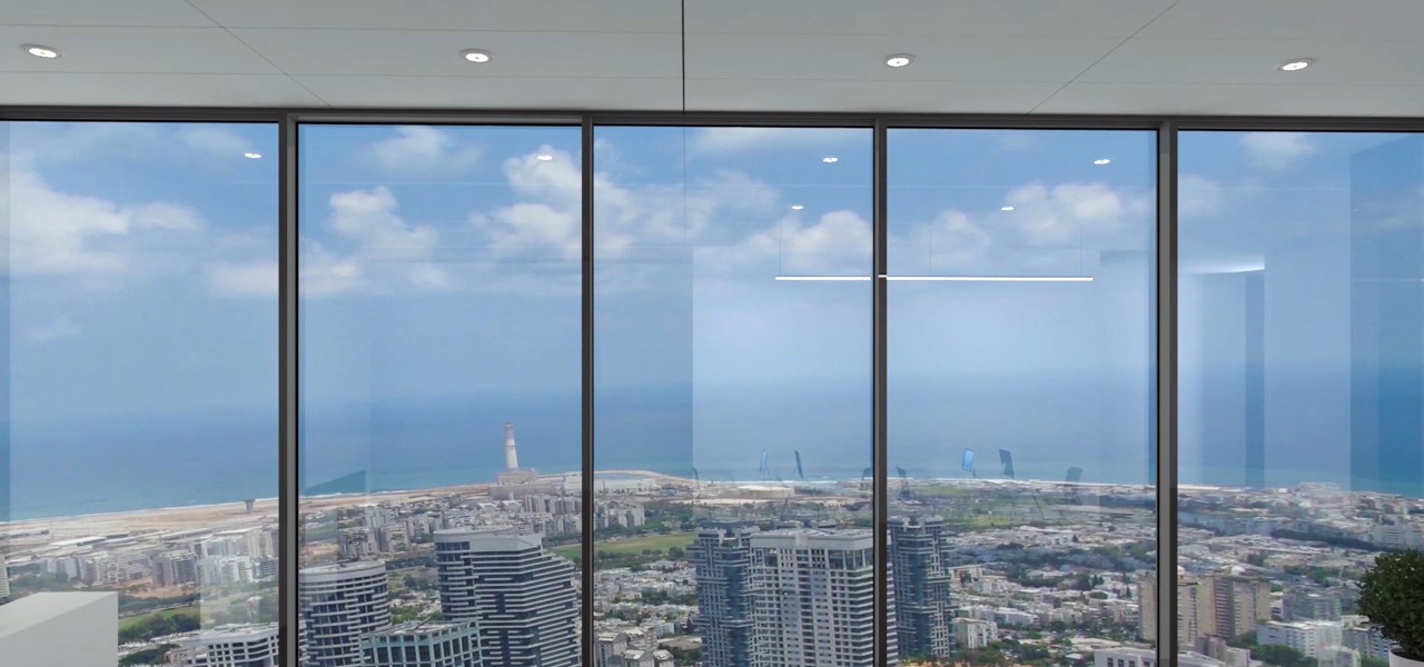 קירות מסך מתקדמים KLIL Sky eGRAF להחלפת יחידת הזיגוג מתוך הבניין